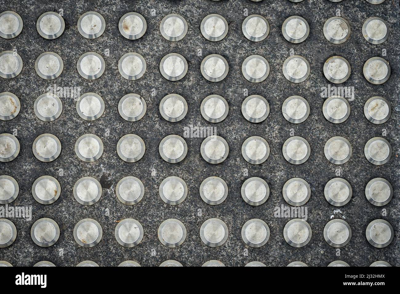 A background detail of footpath aluminum tar Stock Photo - Alamy