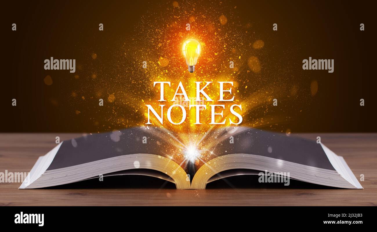 Educational inscription coming out from an open book Stock Photo - Alamy