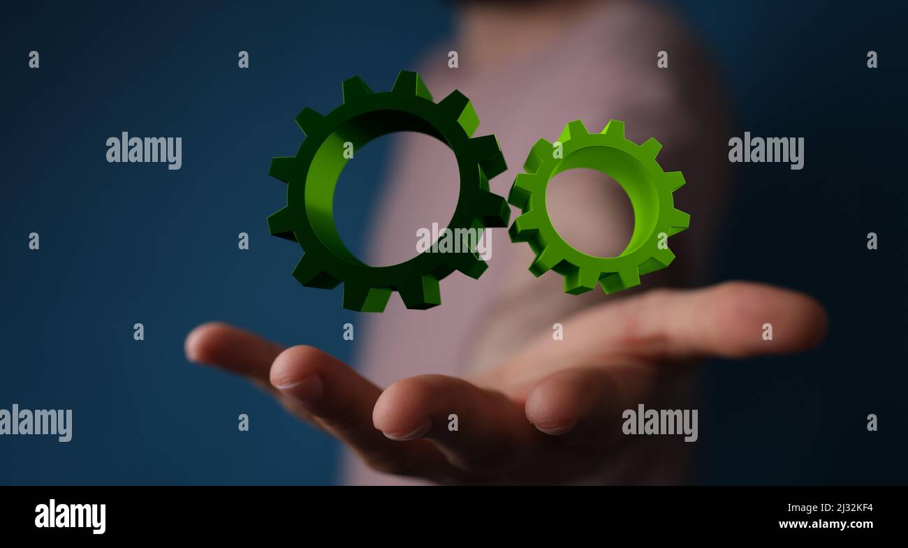 3d rendered green metallic gears and cogs in mans hand Stock Photo - Alamy