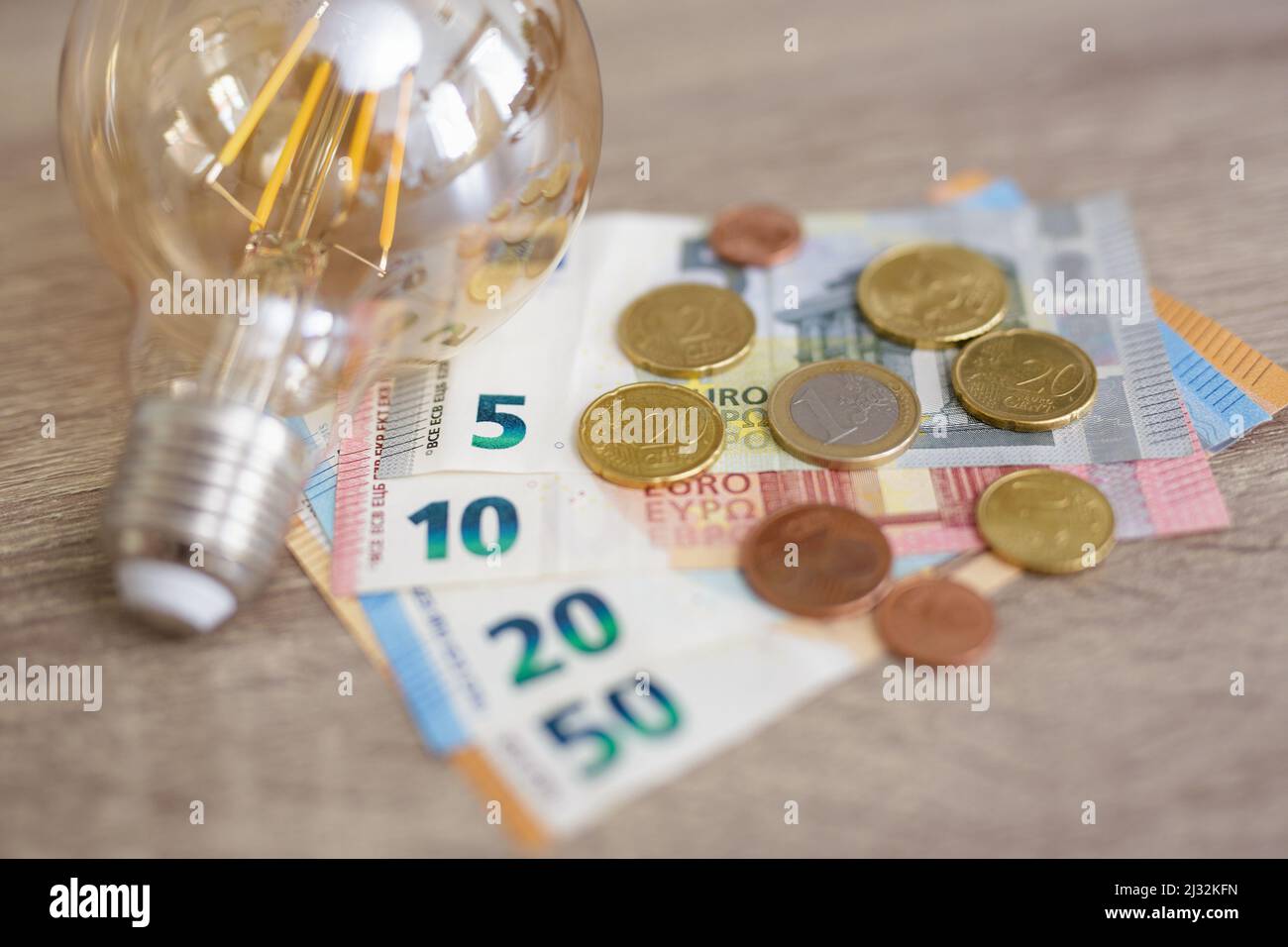 expensive energy bill and rise in electricity prices concept - light ...