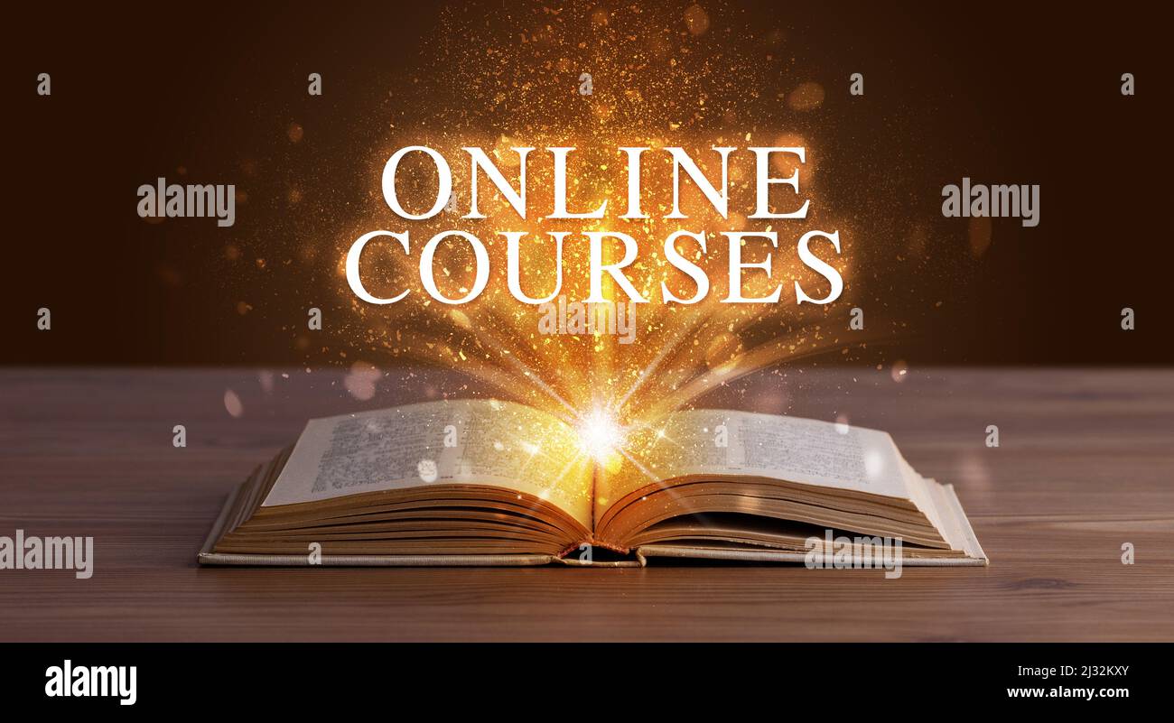 Educational inscription coming out from an open book Stock Photo - Alamy