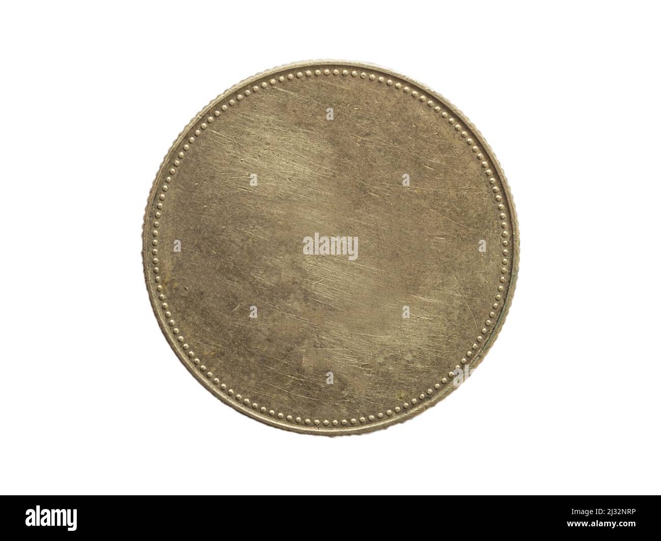 A closeup of a blank metal coin on a plain white background for ...