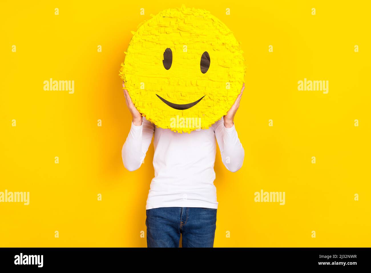Photo of funny funky guy dressed white shirt holding smiley cover face ...