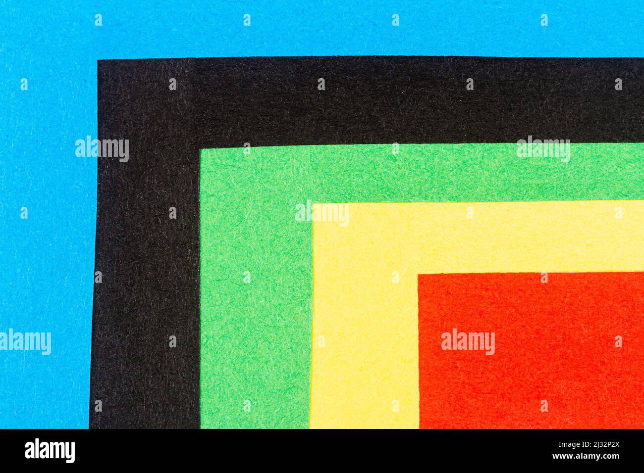 Multicolor background from a paper of different colors. Abstract ...