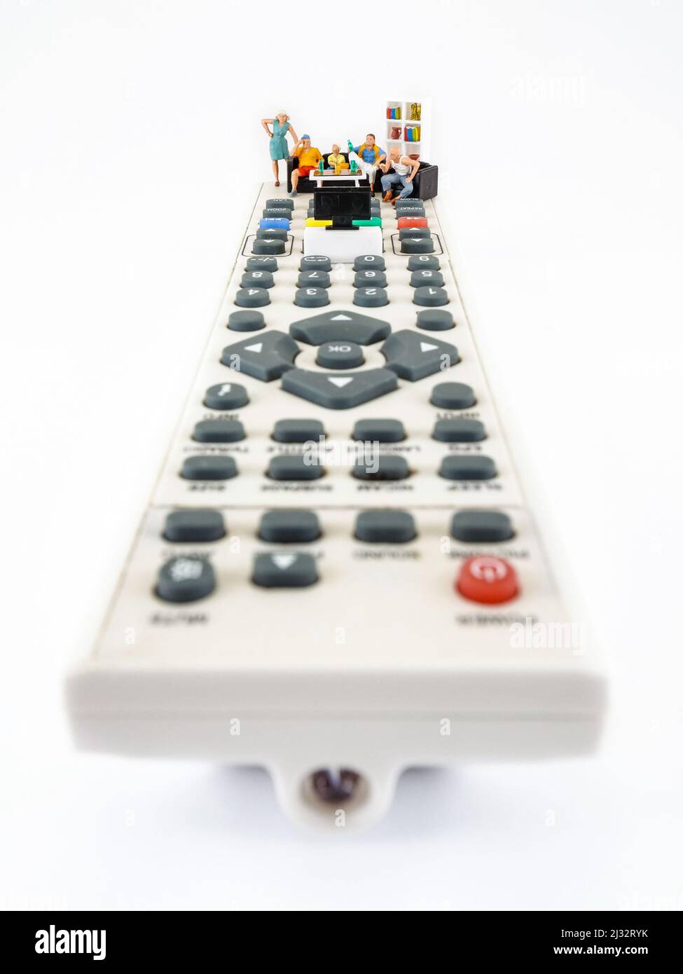 Family spending time together channel surfing and watching a television ...