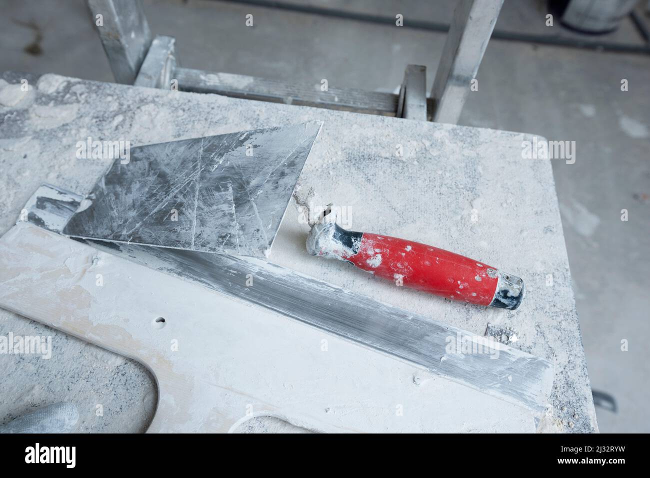 Attic finishing construction site in the phase drywall spackling and ...