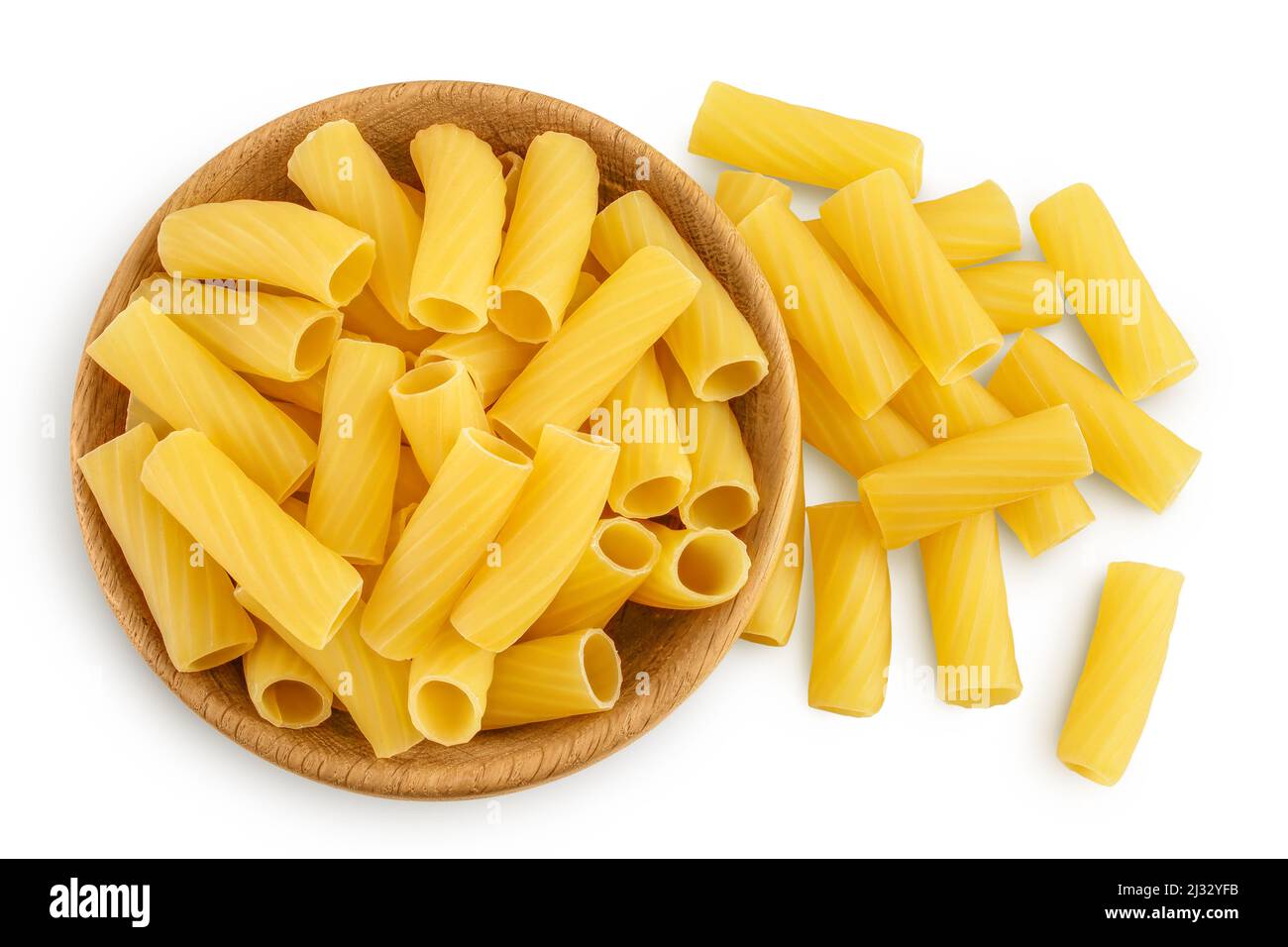 raw italian Rigatoni pasta in wooden bowl isolated on white background ...