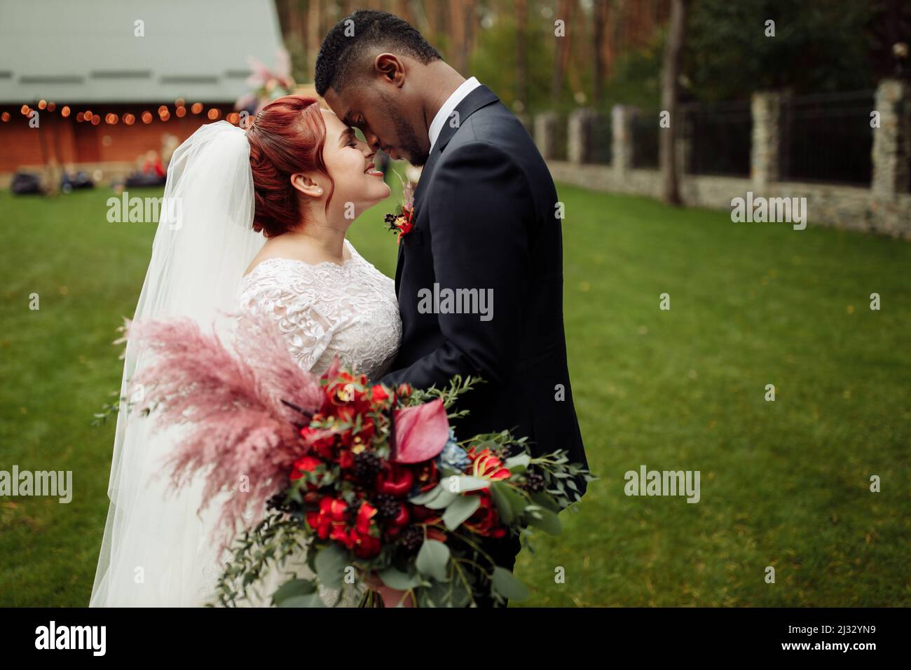Adorable couple on wedding day, handsome African American man with ...