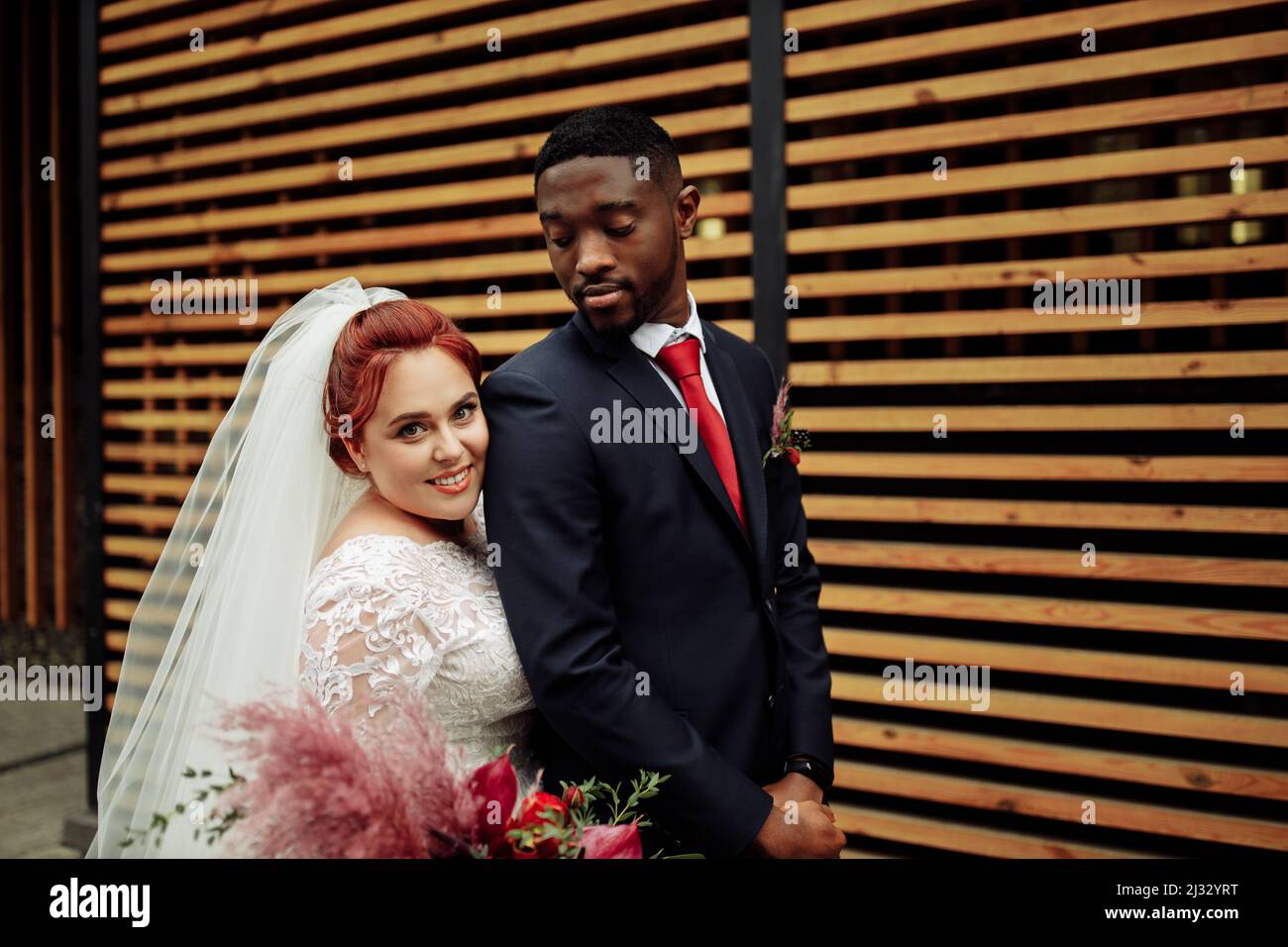 Adorable couple on wedding day, beautiful bride cuddle with charming ...