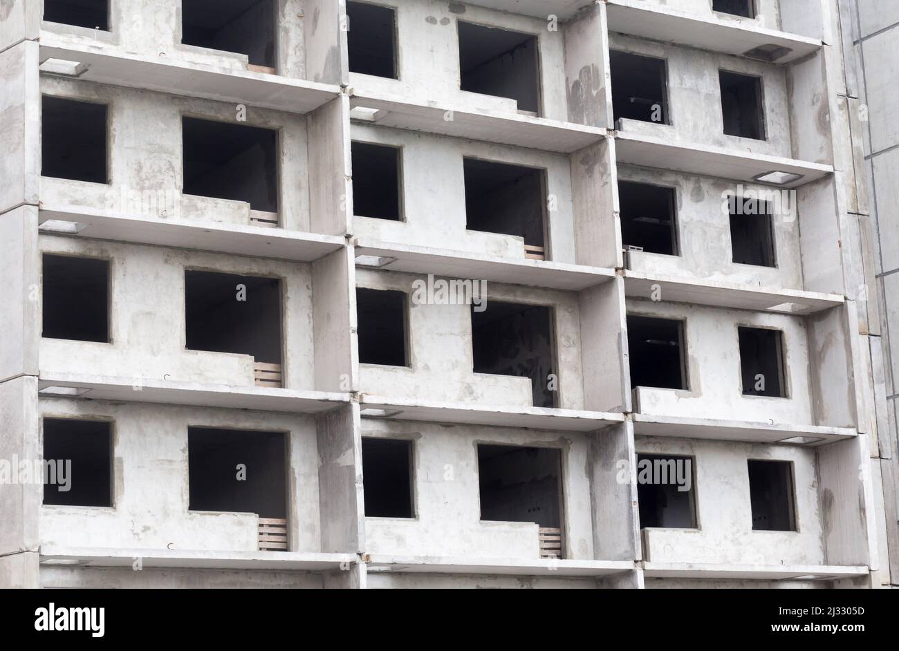 Facade of a modern building under construction. Multi-storey ...