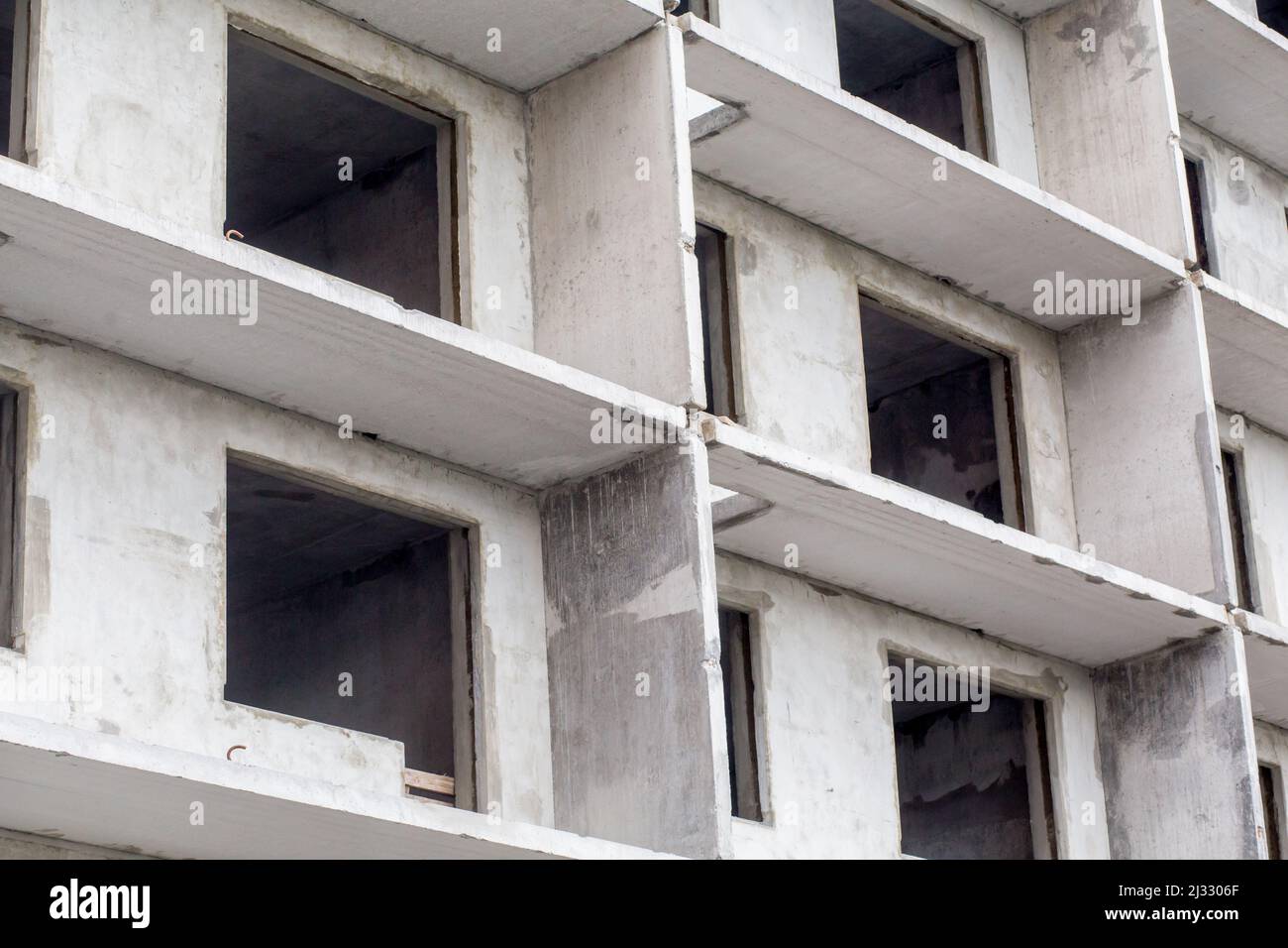 Facade of a modern building under construction. Multi-storey ...