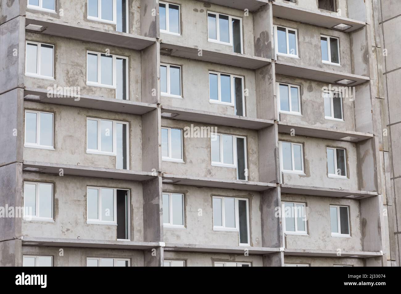 Facade of a modern building under construction. Multi-storey ...