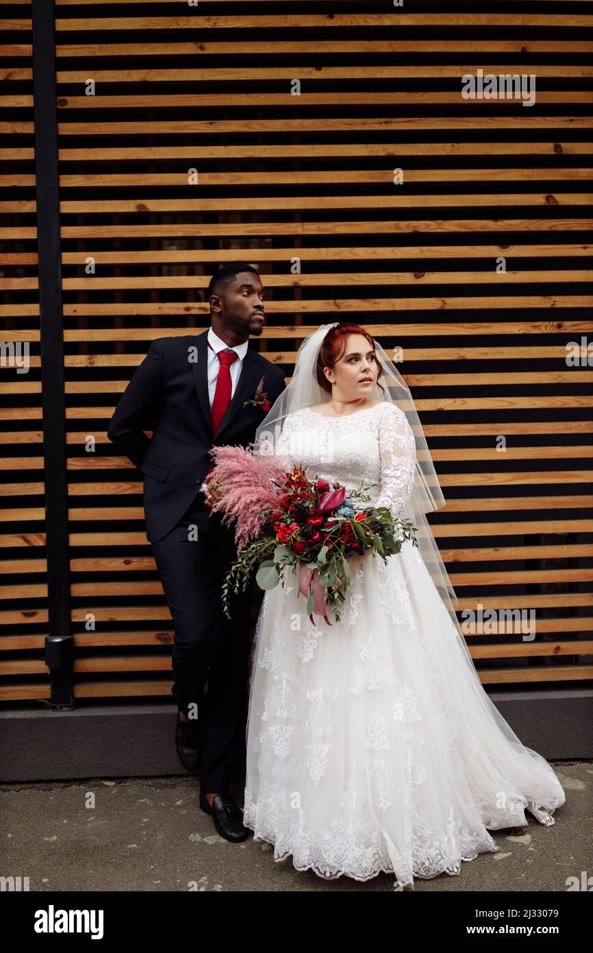 Adorable couple on wedding day, beautiful bride cuddle with charming ...