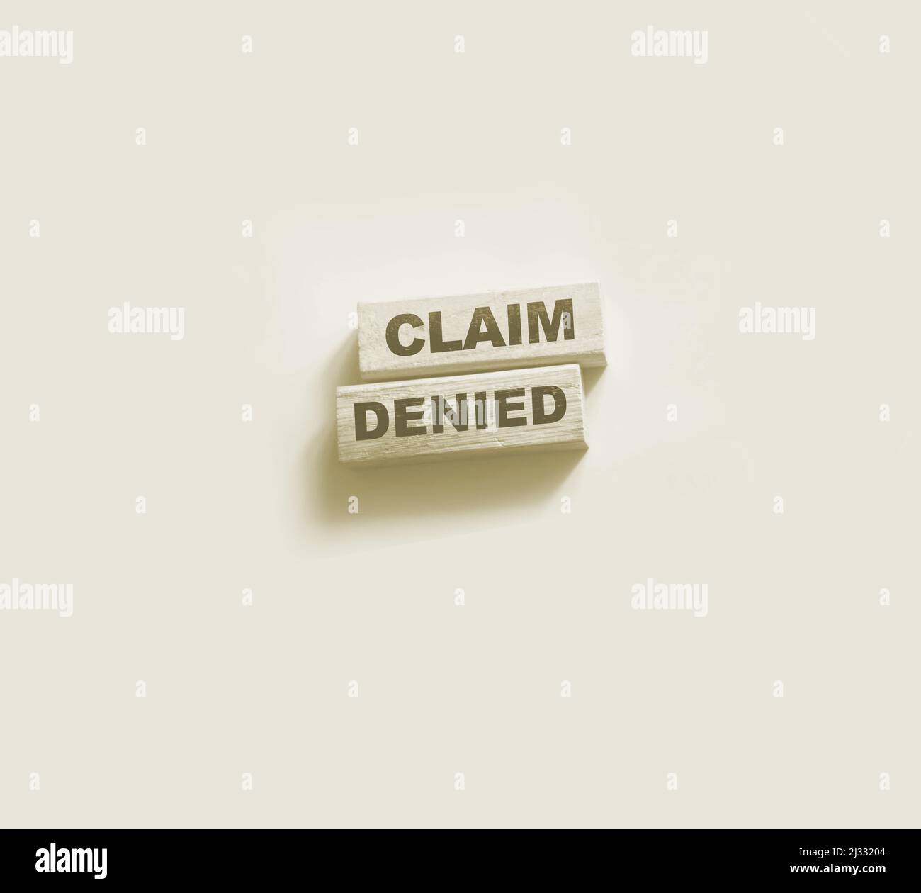 Wooden Blocks with the text: Claim Denied. Insurance Business concept ...