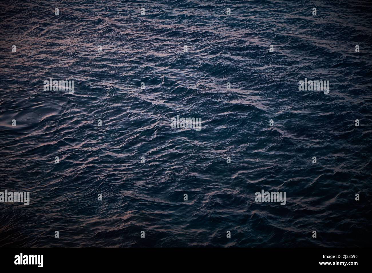 Sea filling format from above, dark Stock Photo - Alamy