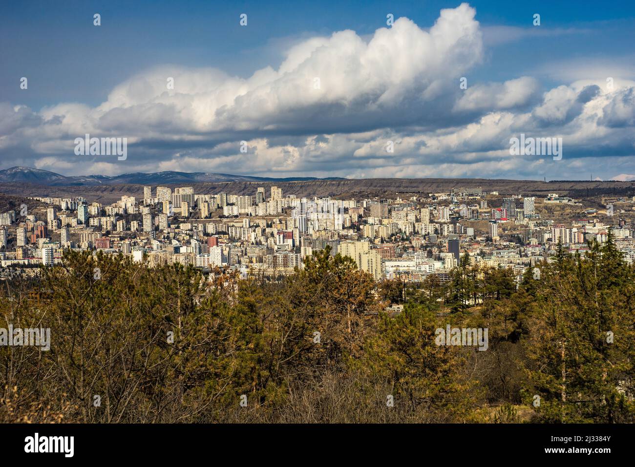 Spring view to Tbilisi city with blue sky and white clouds Stock Photo ...
