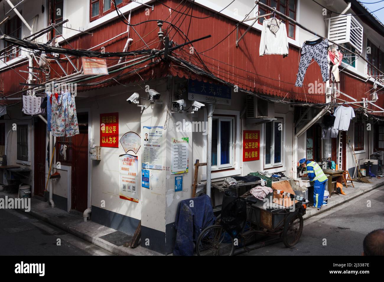 Surveillance cameras at old neighborhood in Shanghai Stock Photo - Alamy