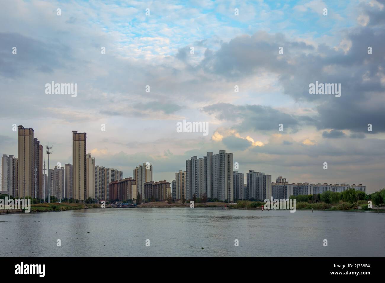 A modern structures near the river Stock Photo - Alamy