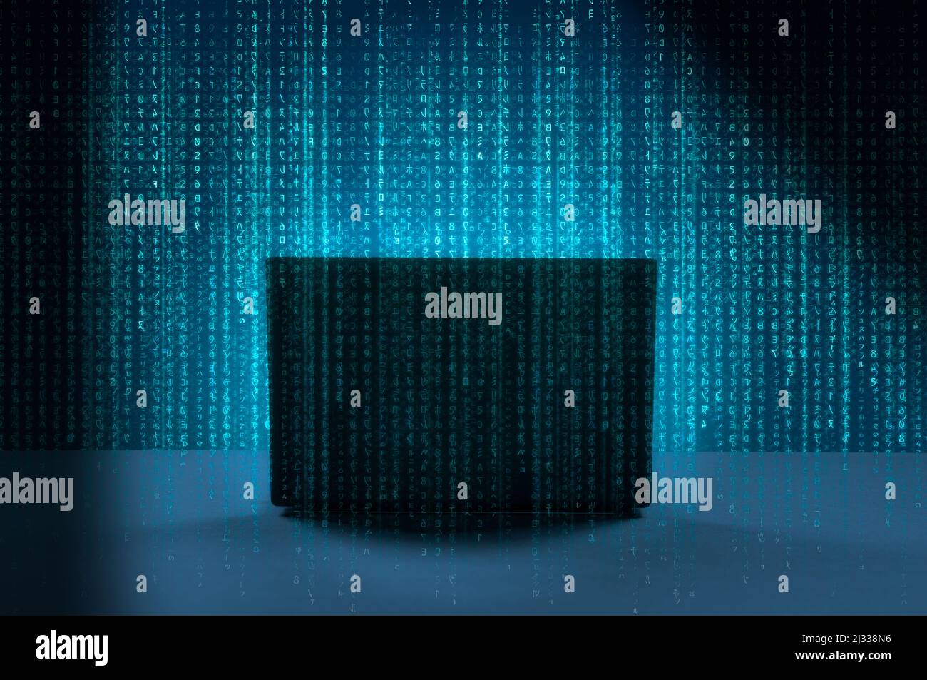 technological digital background. Laptop on table in dark room on ...