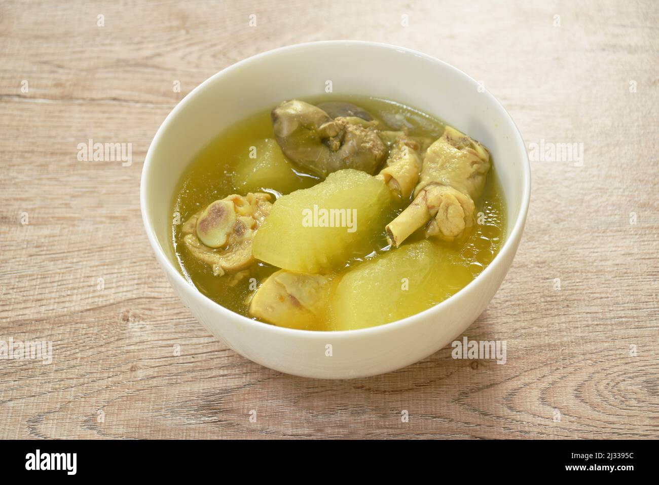 spicy boiled winter melon with chicken meat and liver in herb soup on ...