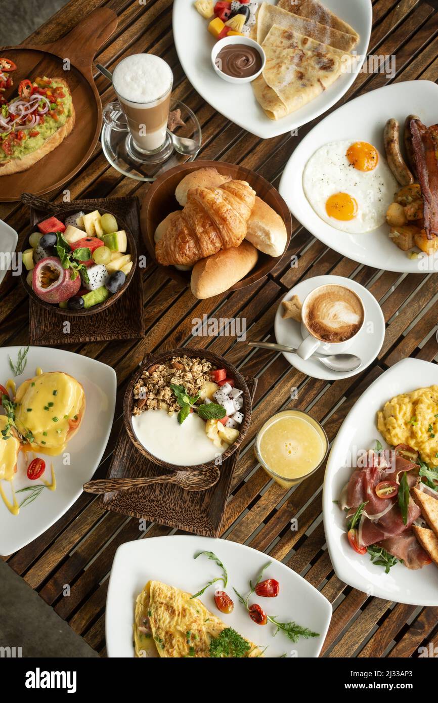 Western big gourmet breakfast selection mixed dishes on french ...