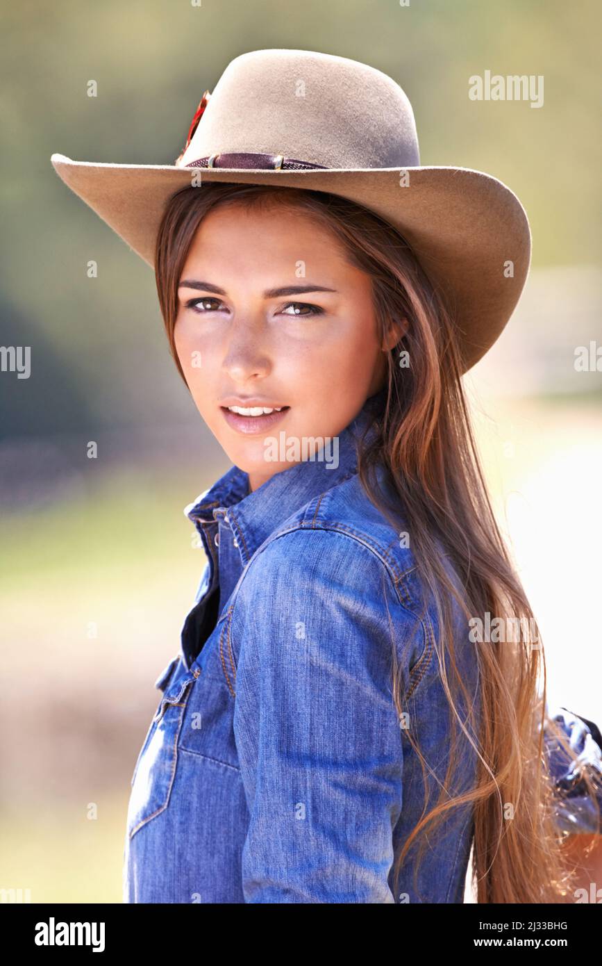 Are yaall ready for me. Portrait of an attractive young cowgirl ...