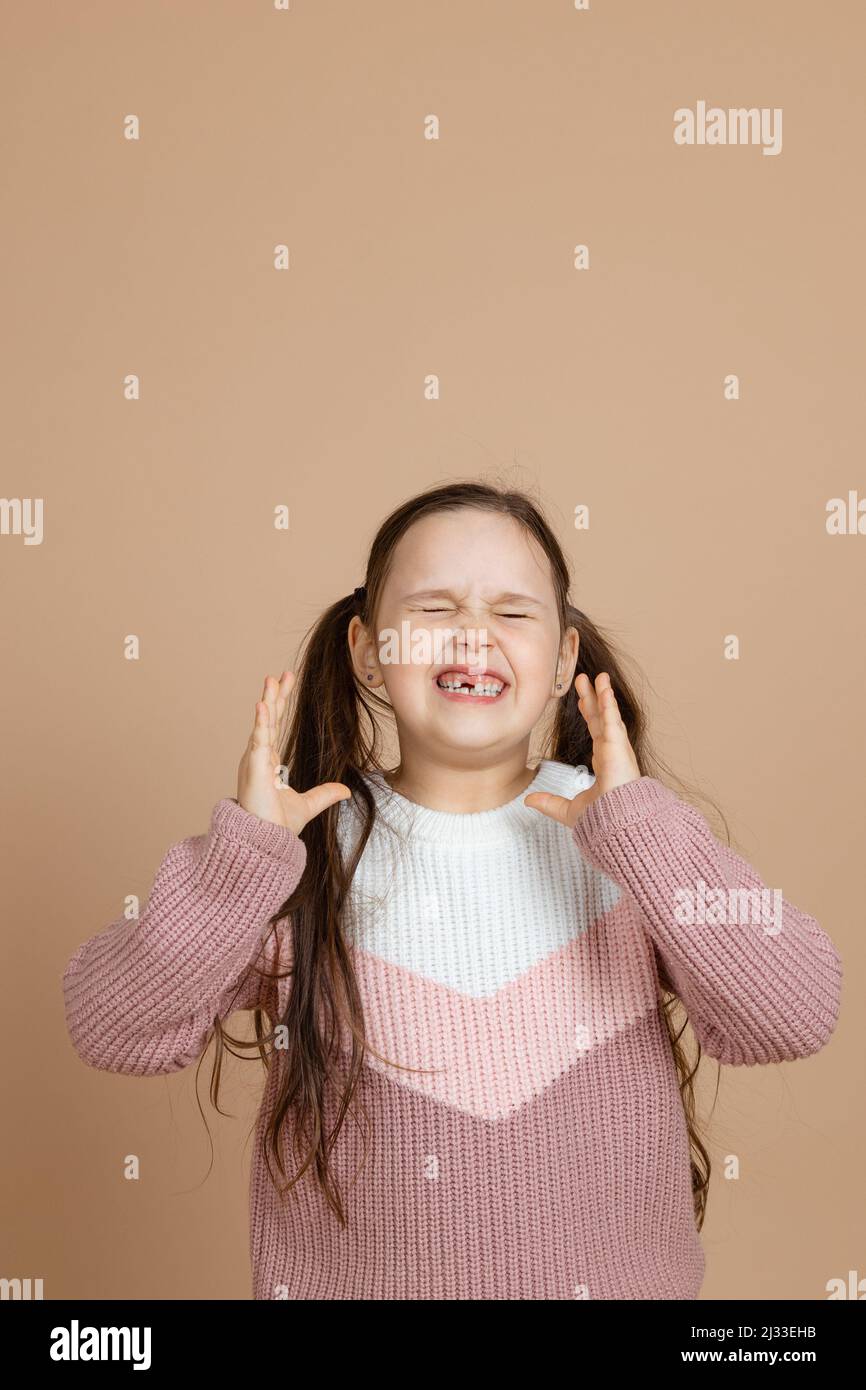 Angry kid girl showing hand hi-res stock photography and images - Alamy