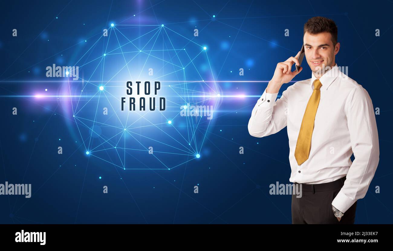 Businessman thinking about security solutions with STOP FRAUD ...
