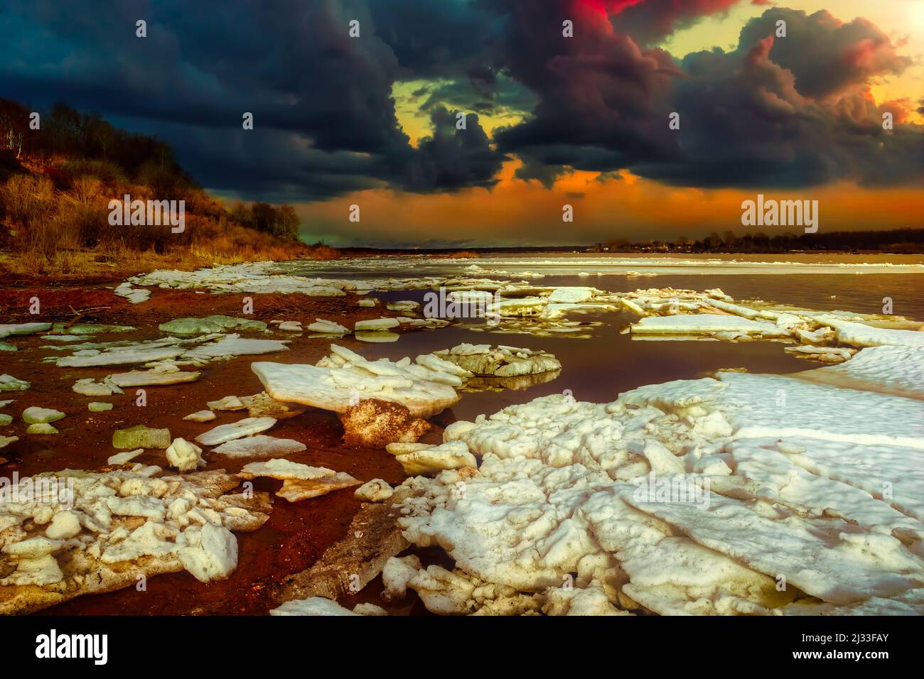 spring landscape on the river ice drift beautiful sunset Stock Photo ...