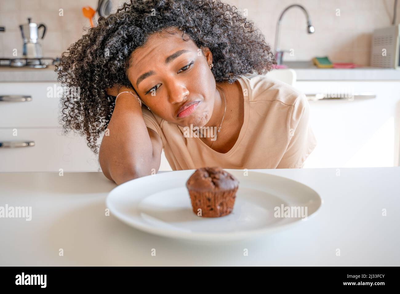 Looking at cake black person hi-res stock photography and images - Alamy