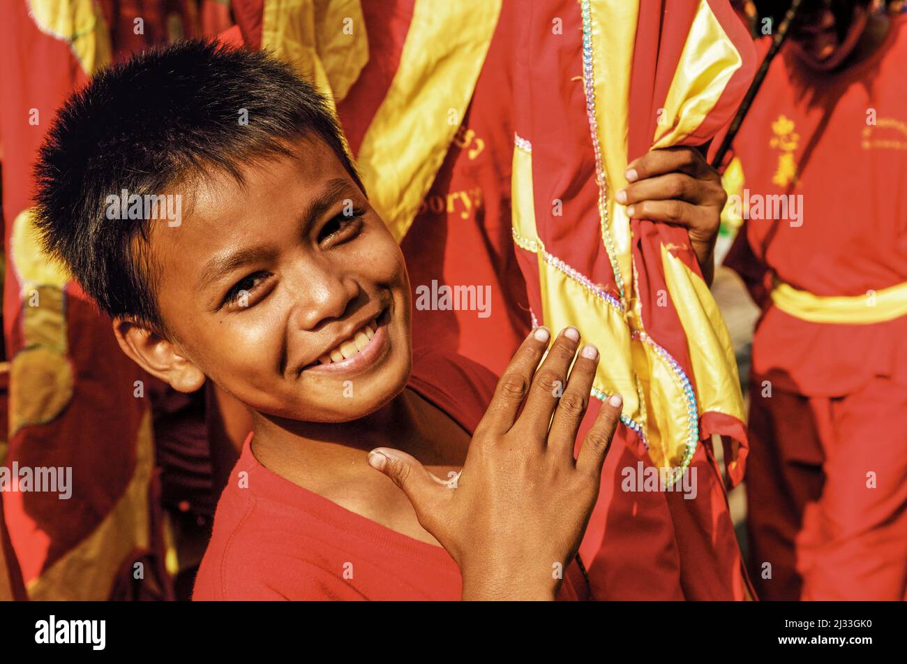 Portrait of a happy Cambodian boy during Chinese New Year (Year of the ...