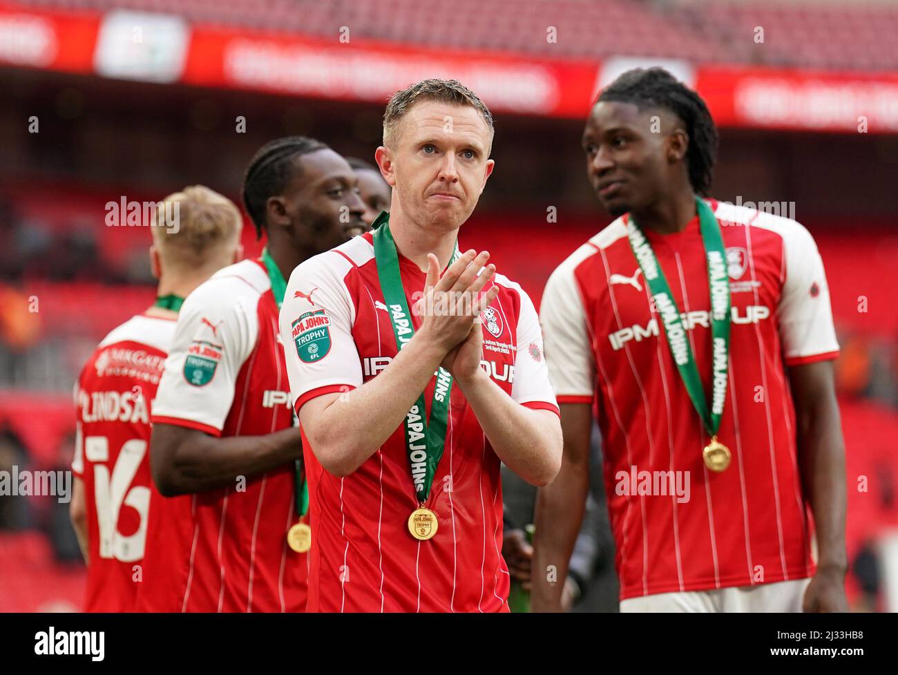 Rotherham United's Shane Ferguson (centre) applauds the fans following ...