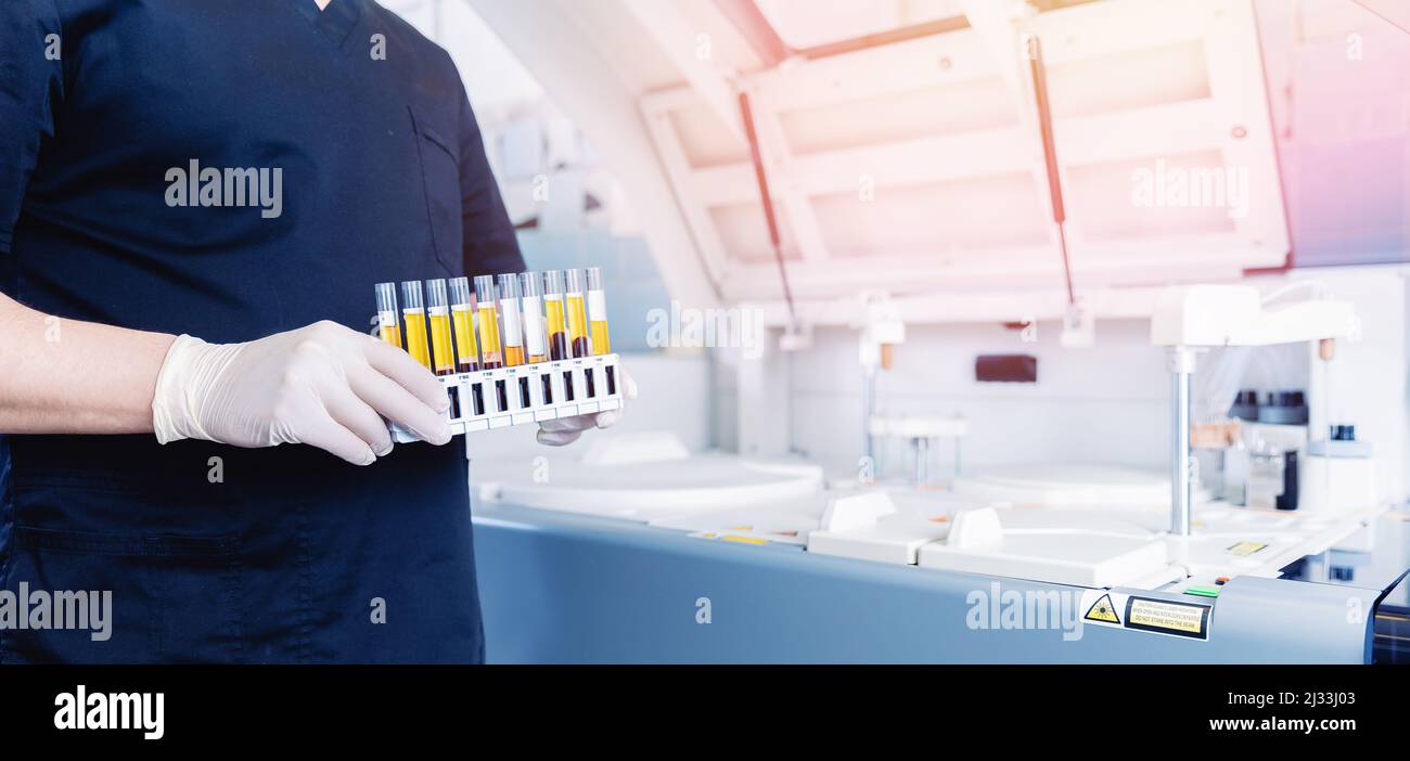 Banner medical blood tests on automatic modern equipment Stock Photo ...