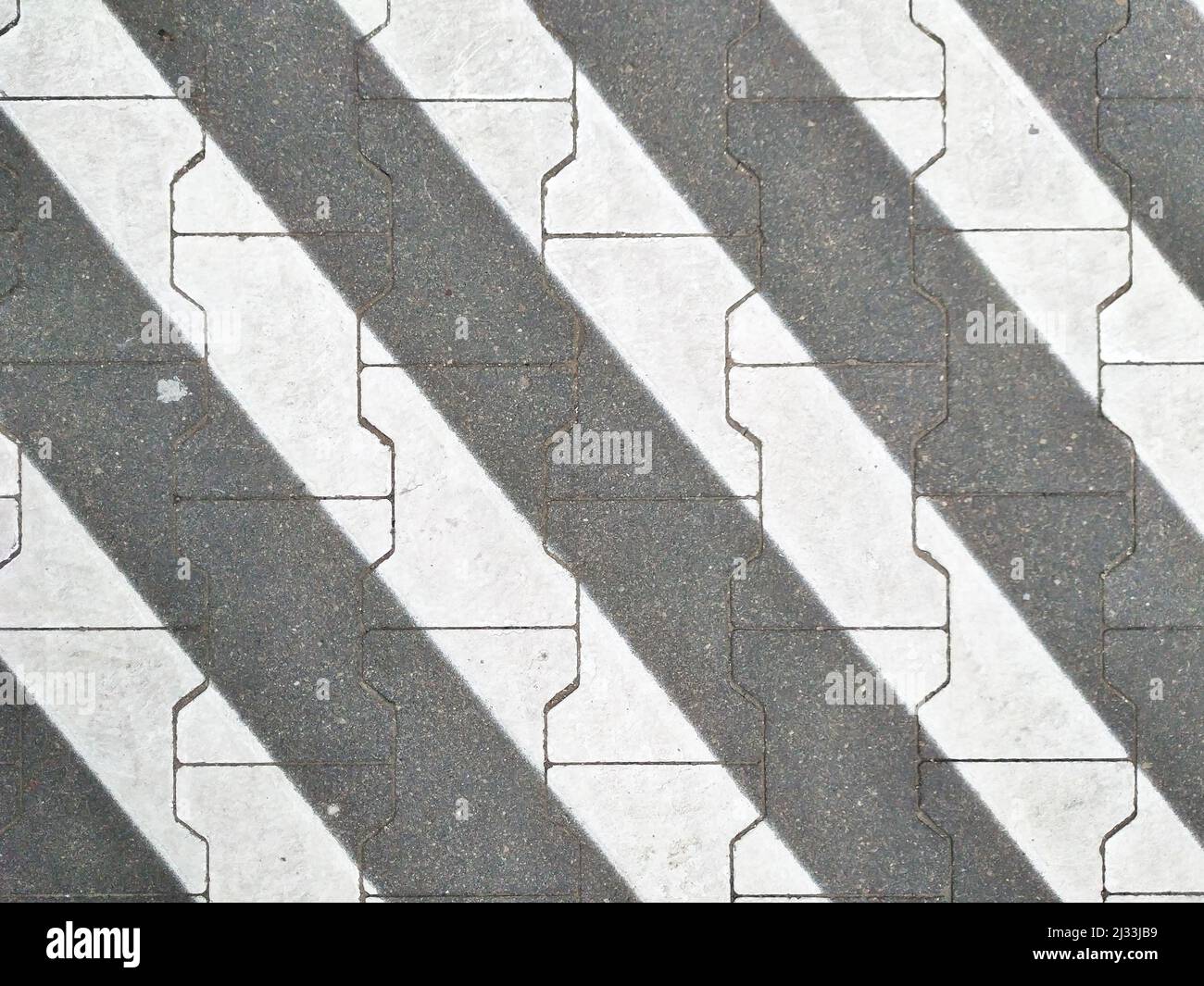 The gray tile paving texture with white stripes Stock Photo - Alamy