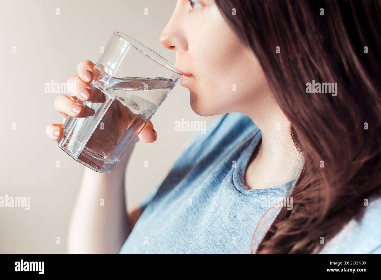Woman drinks clean water. World Water Day. Health care concept. Diet ...