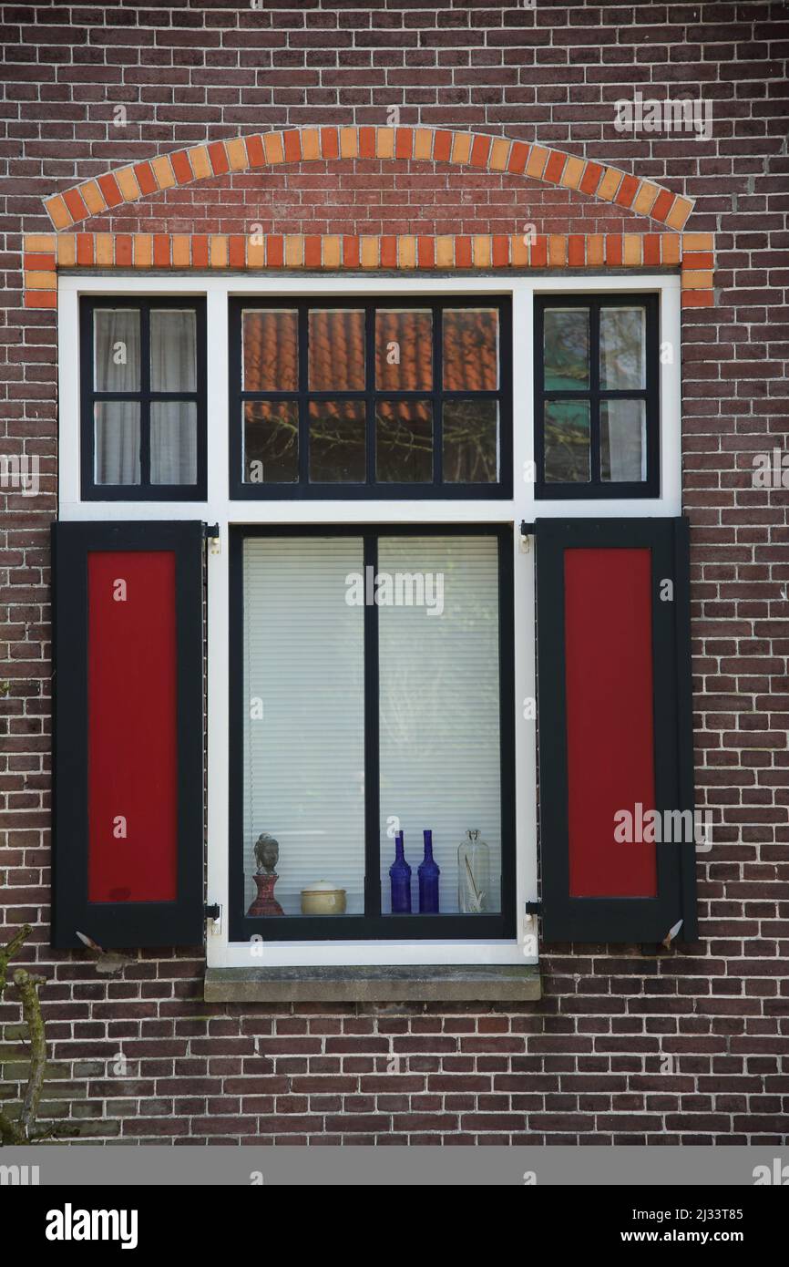 Window with shutters and decoration in Den Burg on Texel, Netherlands ...