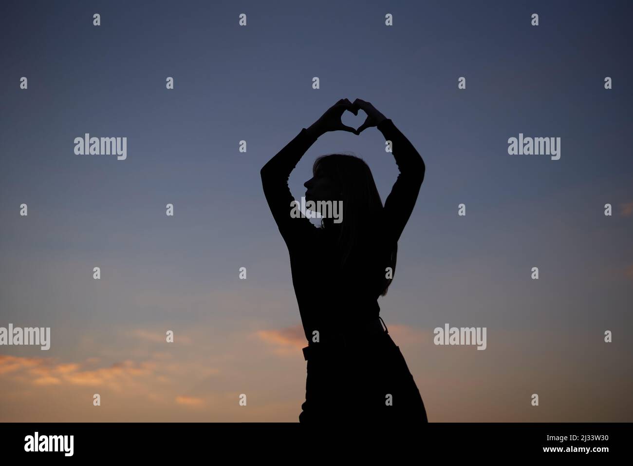 Female long shadow hi-res stock photography and images - Alamy