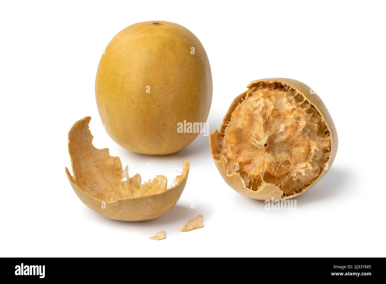 Whole and broken dried monk fruit, luohan guo, isolated on white ...