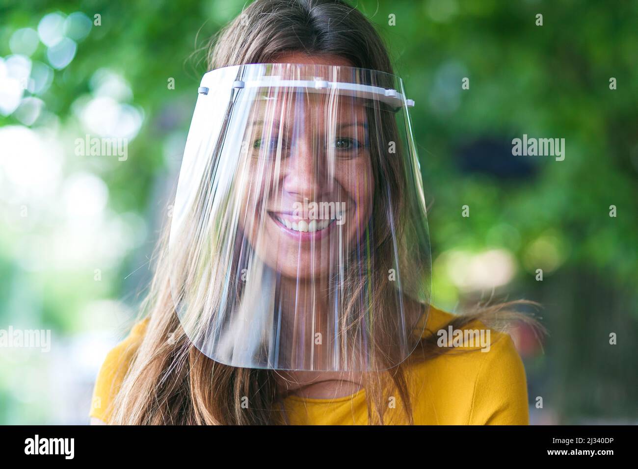 Wearing a face visor hi-res stock photography and images - Alamy