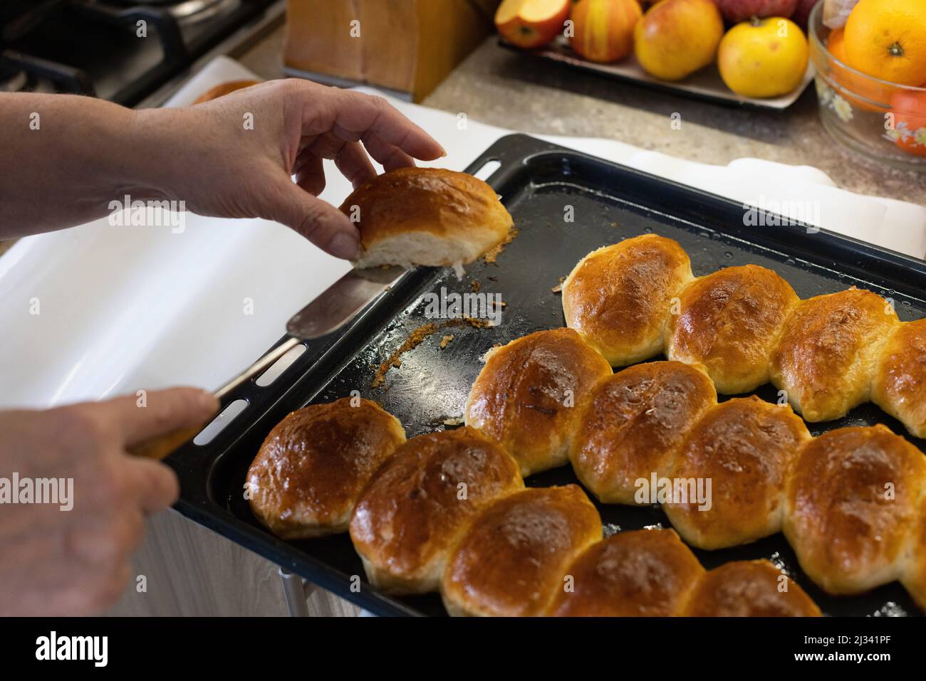 Woman baking pies at home. Pies just from oven Stock Photo - Alamy