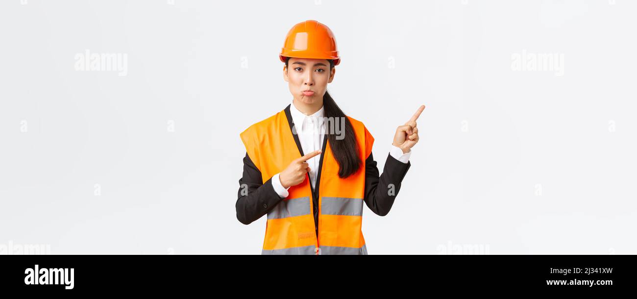 Building, construction and industrial concept. Upset and disappointed ...