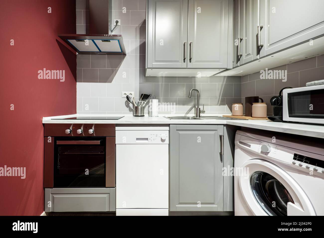 Space washing machine wooden cabinet hi-res stock photography and ...