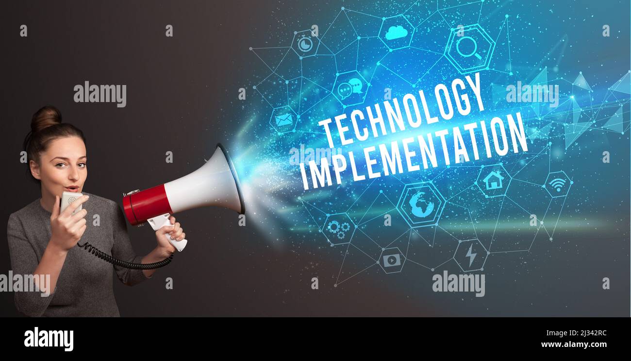 Young woman shouting in megaphone, technology announcement concept ...