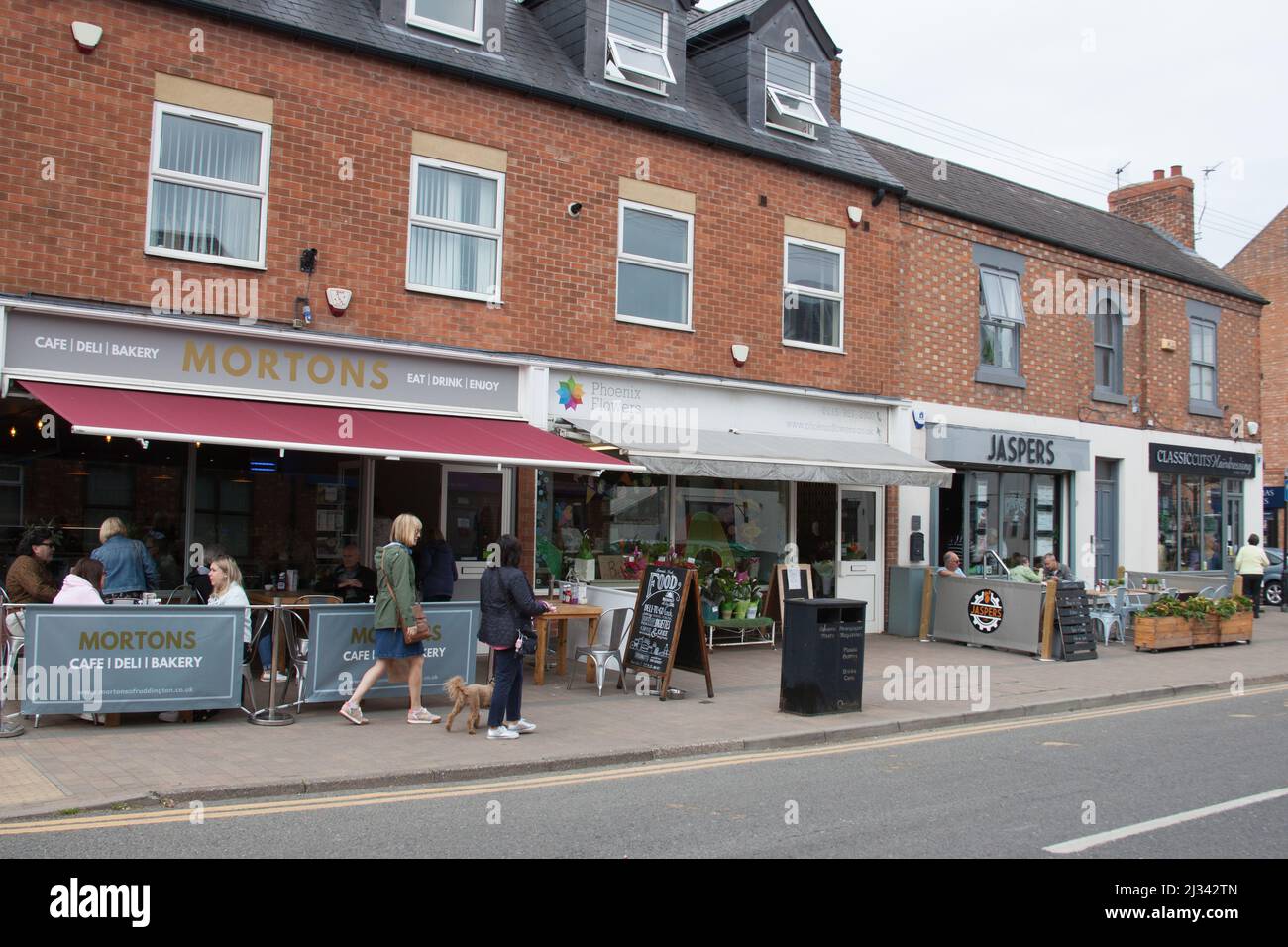 Cafes and shops in Ruddington, Nottinghamshire in the UK Stock Photo ...