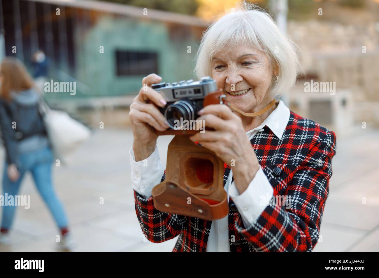 Happy pensioner walking hi-res stock photography and images - Alamy
