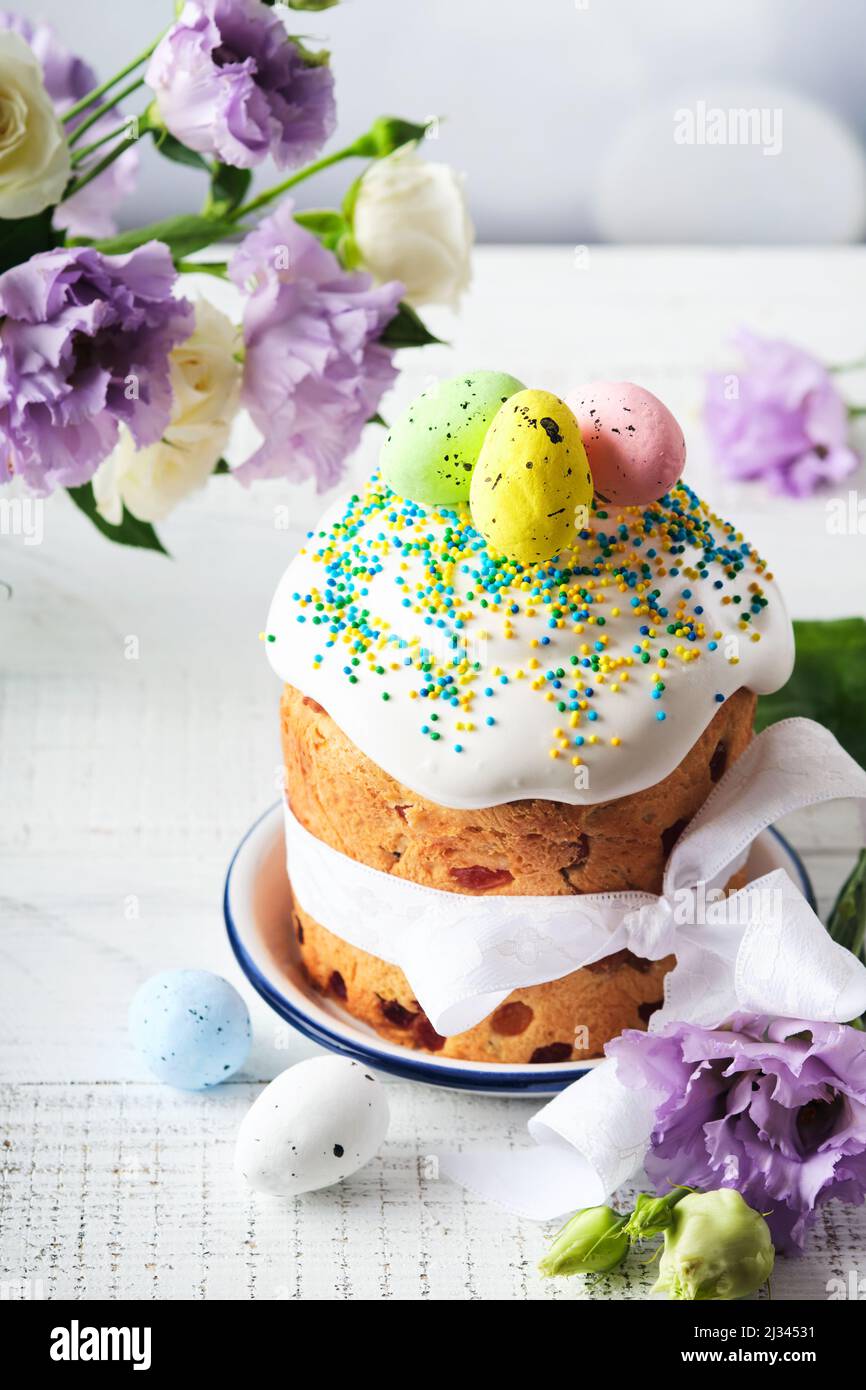 Traditional Easter sweet bread or cakes with white icing and sugar ...
