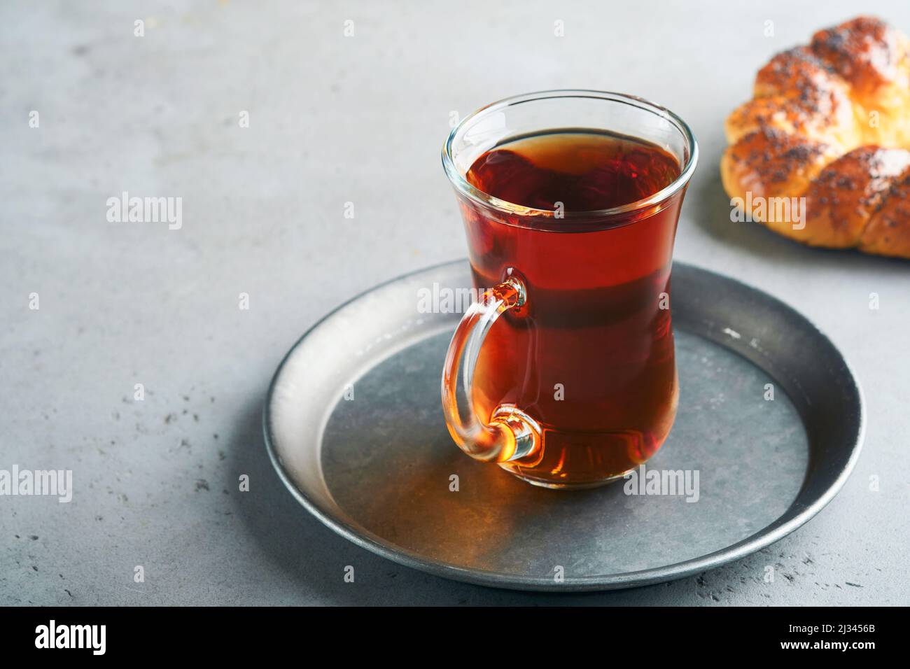 Turkish black tea. Glass cup of turkish black tea and crispy Turkish ...