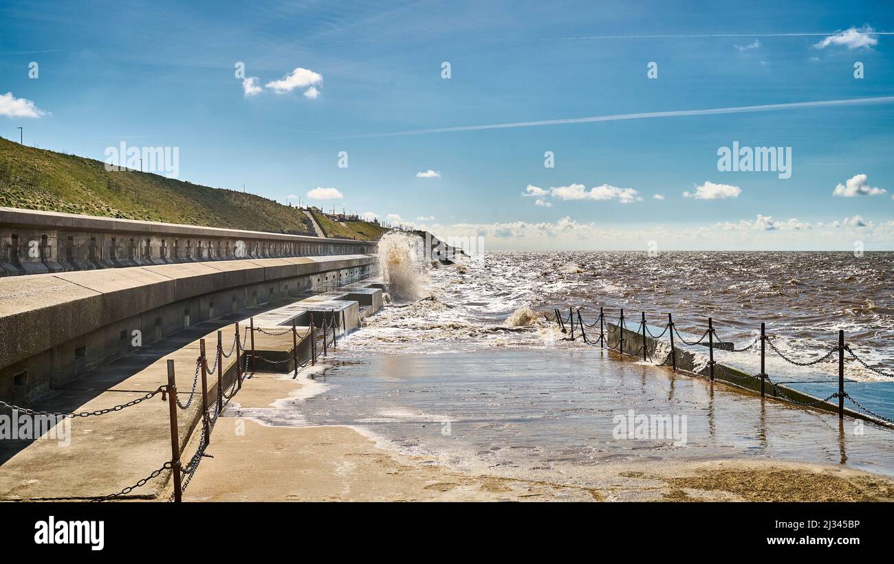 Waves breaking against seawall hi-res stock photography and images - Alamy