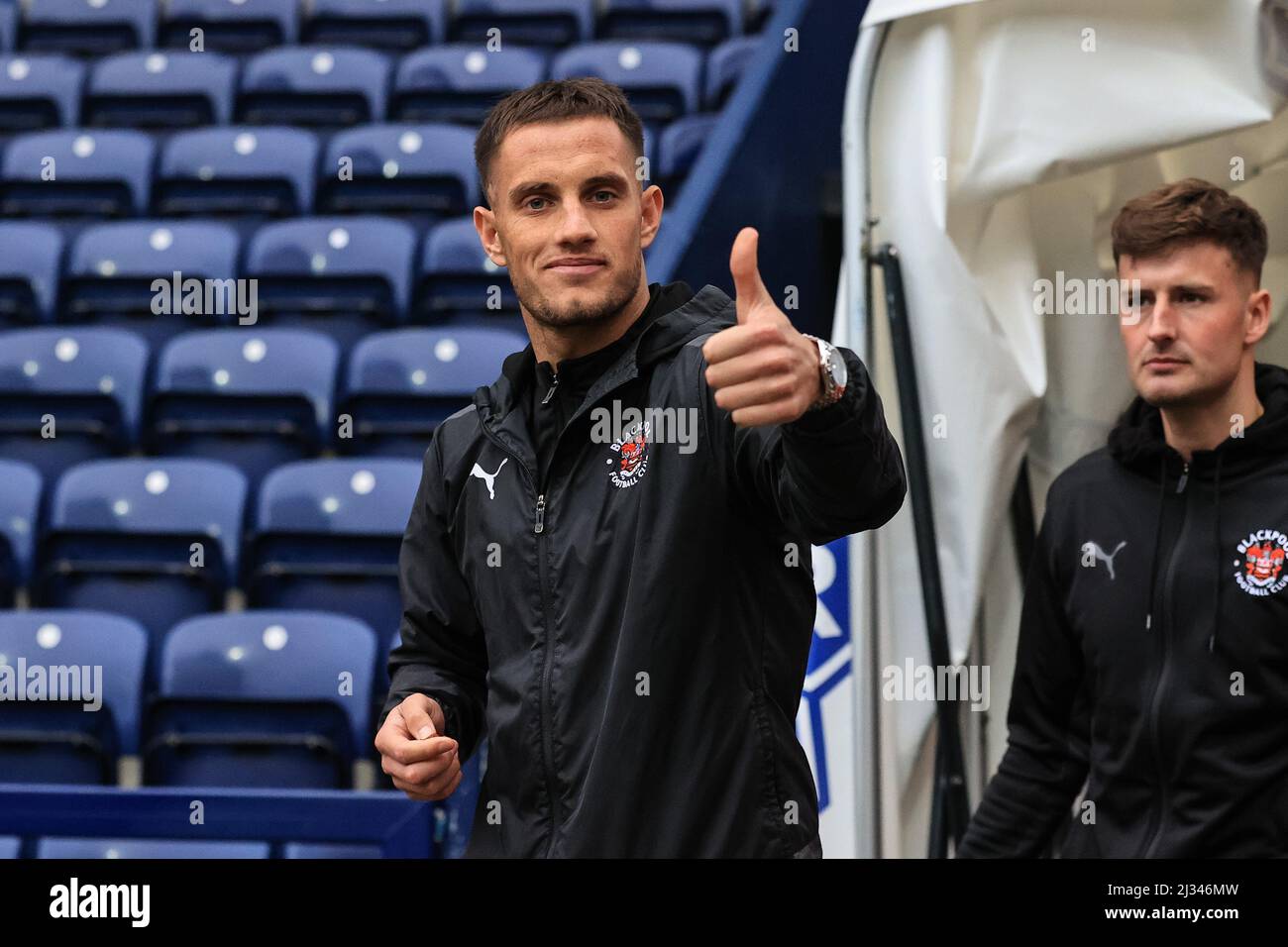 Jerry Yates #9 of Blackpool gives the thumbs up as he arrives at ...