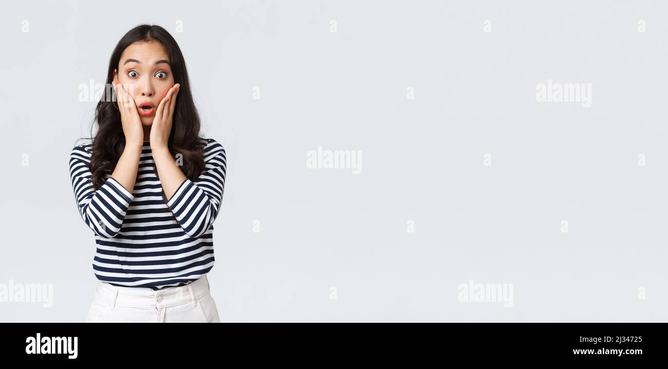 Lifestyle, people emotions and casual concept. Surprised gasping woman ...